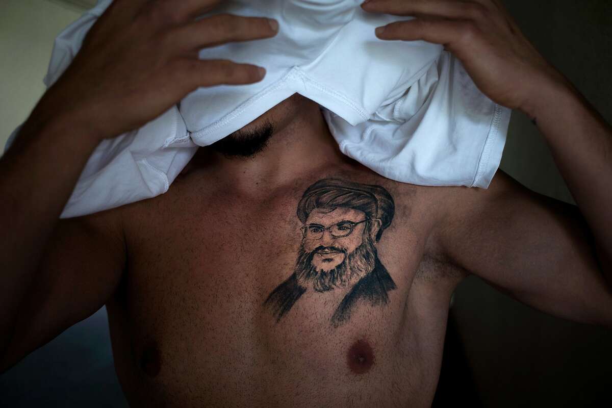 Shiite tattoos show pride amid tensions in Lebanon