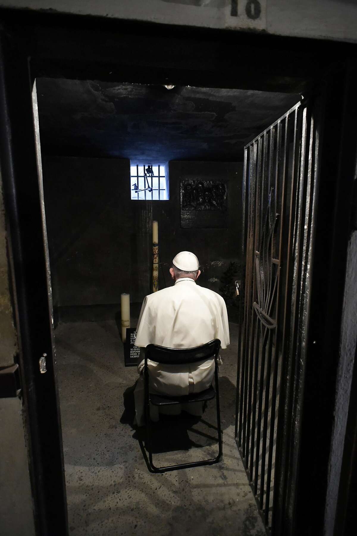 Pope visits Auschwitz, begs God to forgive ‘so much cruelty’