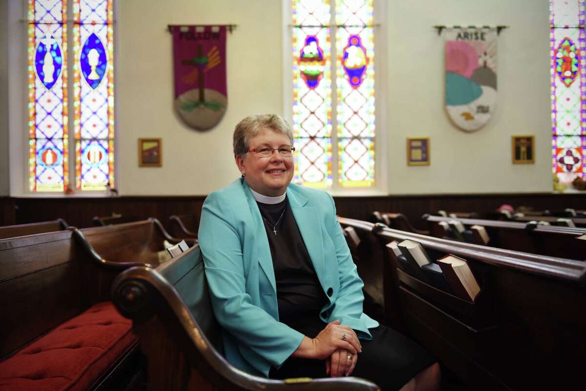 Priest serves parish; heads Rensselaer County agency