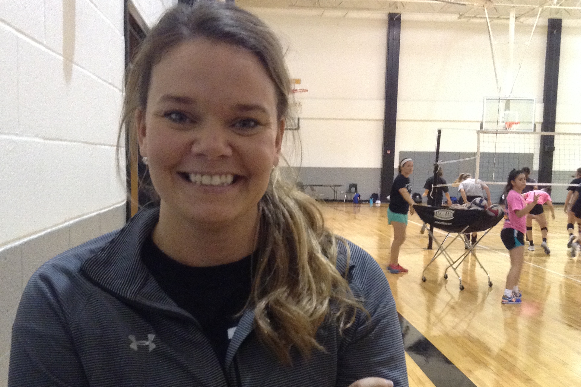 Clark volleyball coach happy to be back home