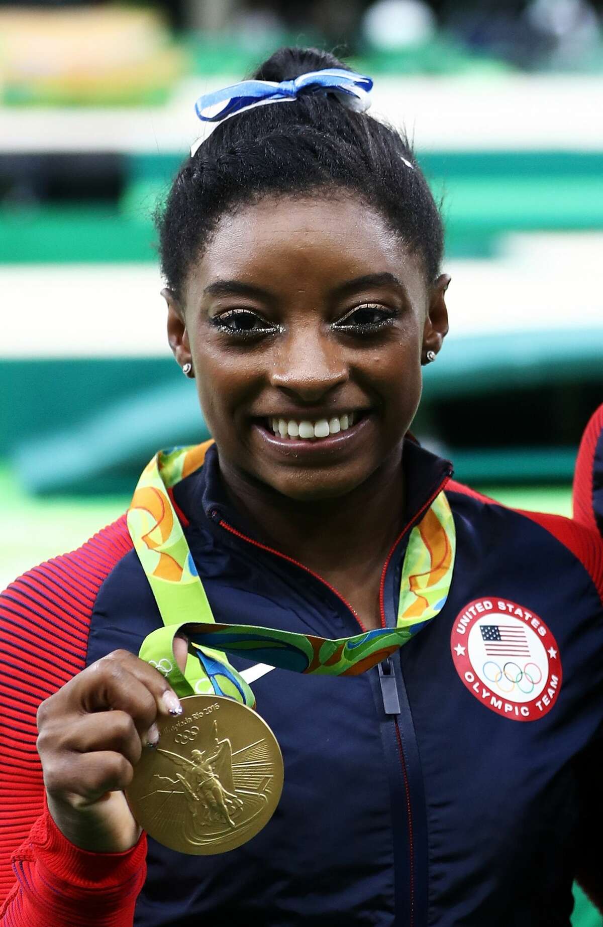 Simone Biles returns to Houston after dominating Olympic gymnastics ...