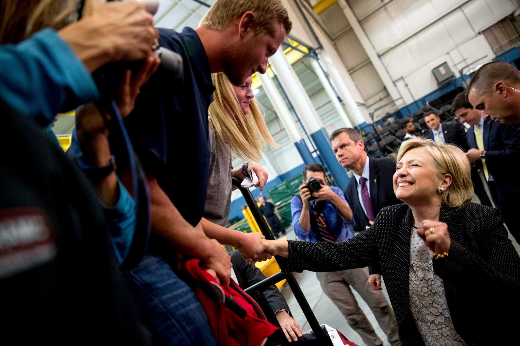 Clinton calls Trump enemy of 'the little guy'