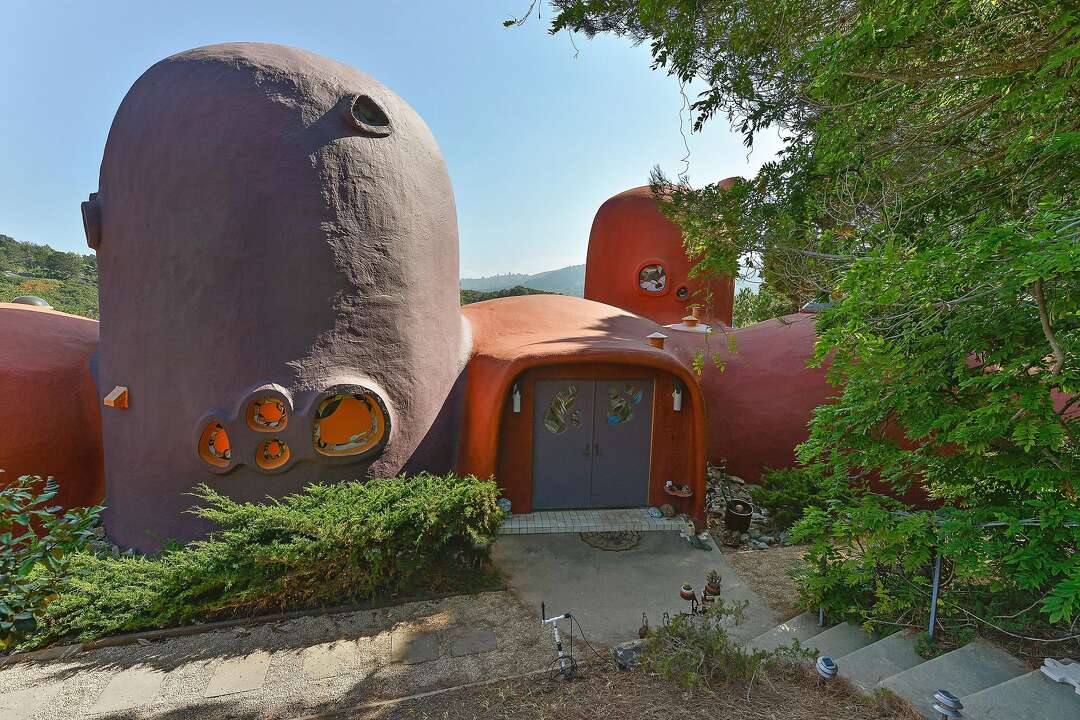 Iconic Flintstone house welcomes new residents – a herd of massive dino ...