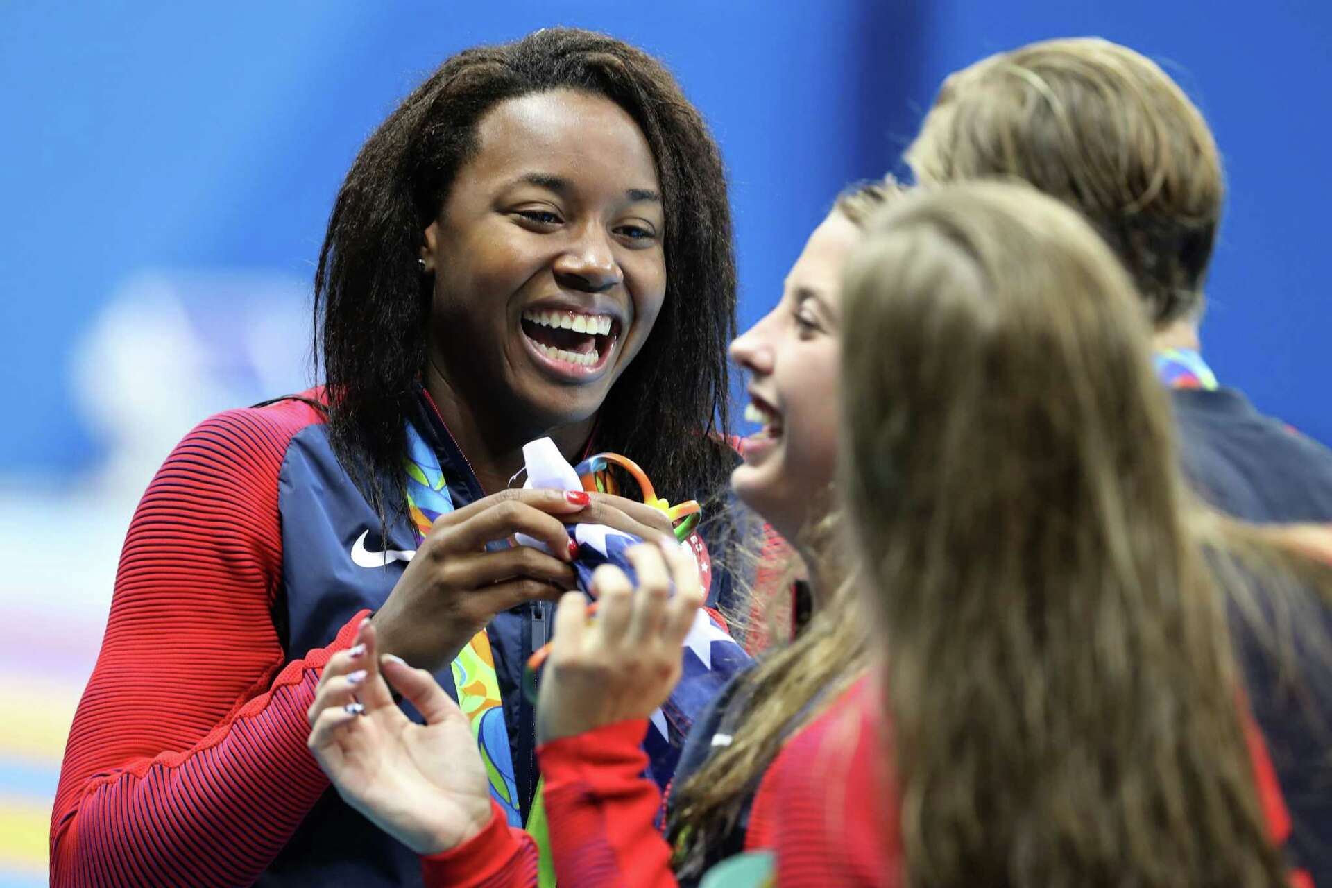 Simone Manuel rules in pool and on larger front