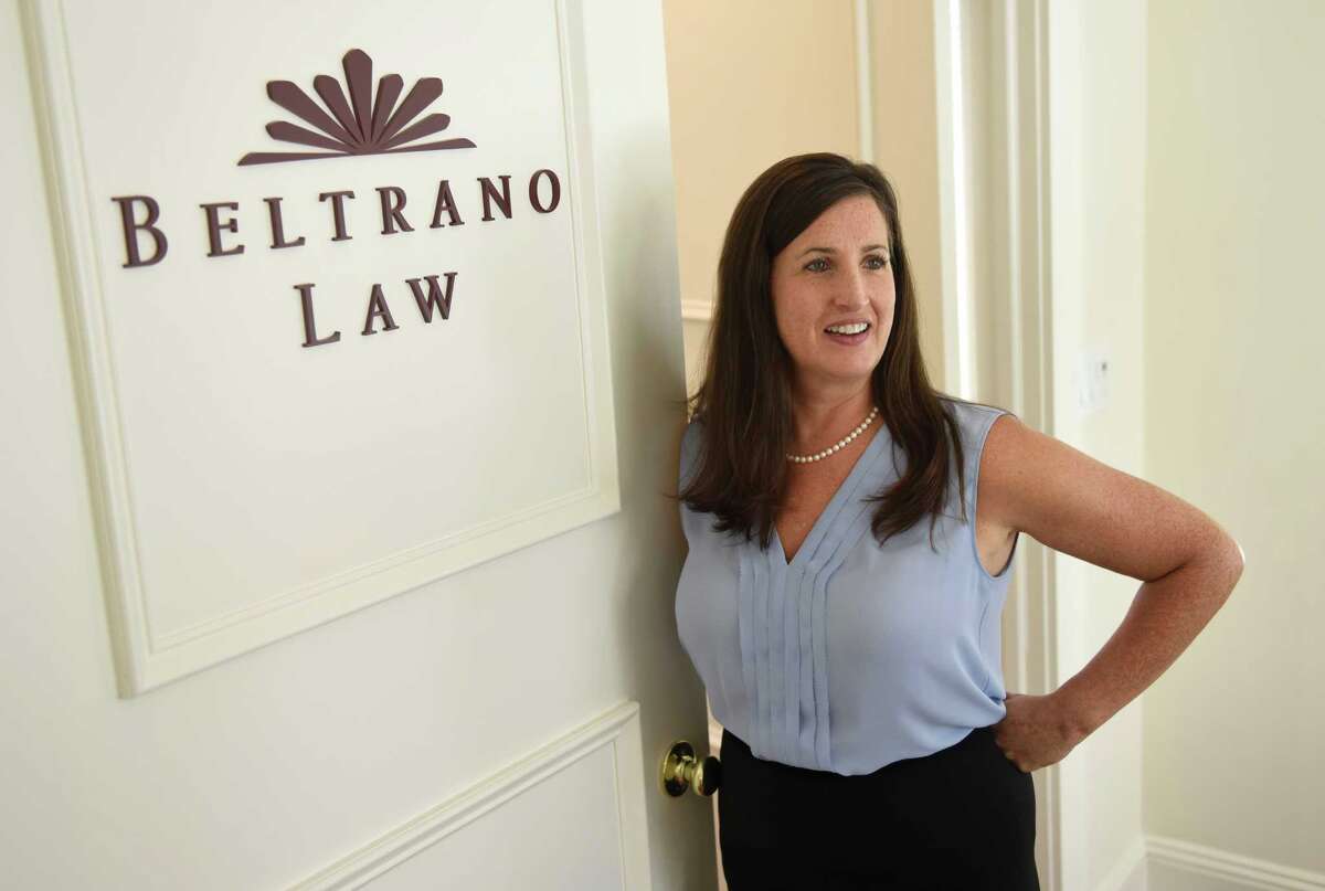 At Home in Greenwich prez knows medicine, and the law