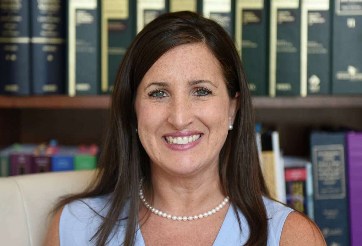 At Home in Greenwich prez knows medicine, and the law