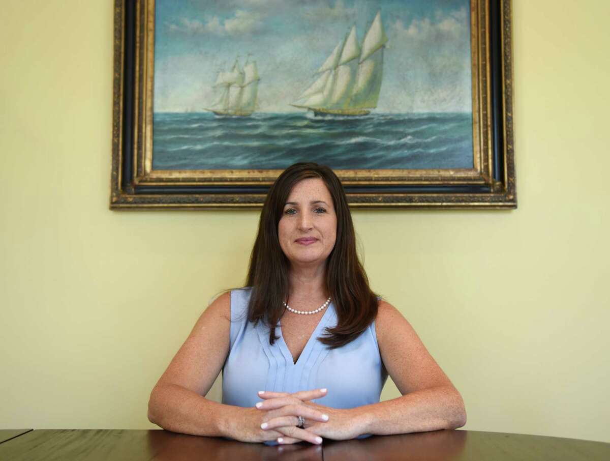 At Home in Greenwich prez knows medicine, and the law