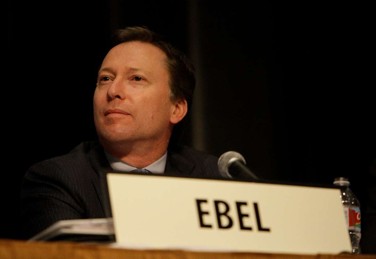 Executive pay still rising despite energy's downturn