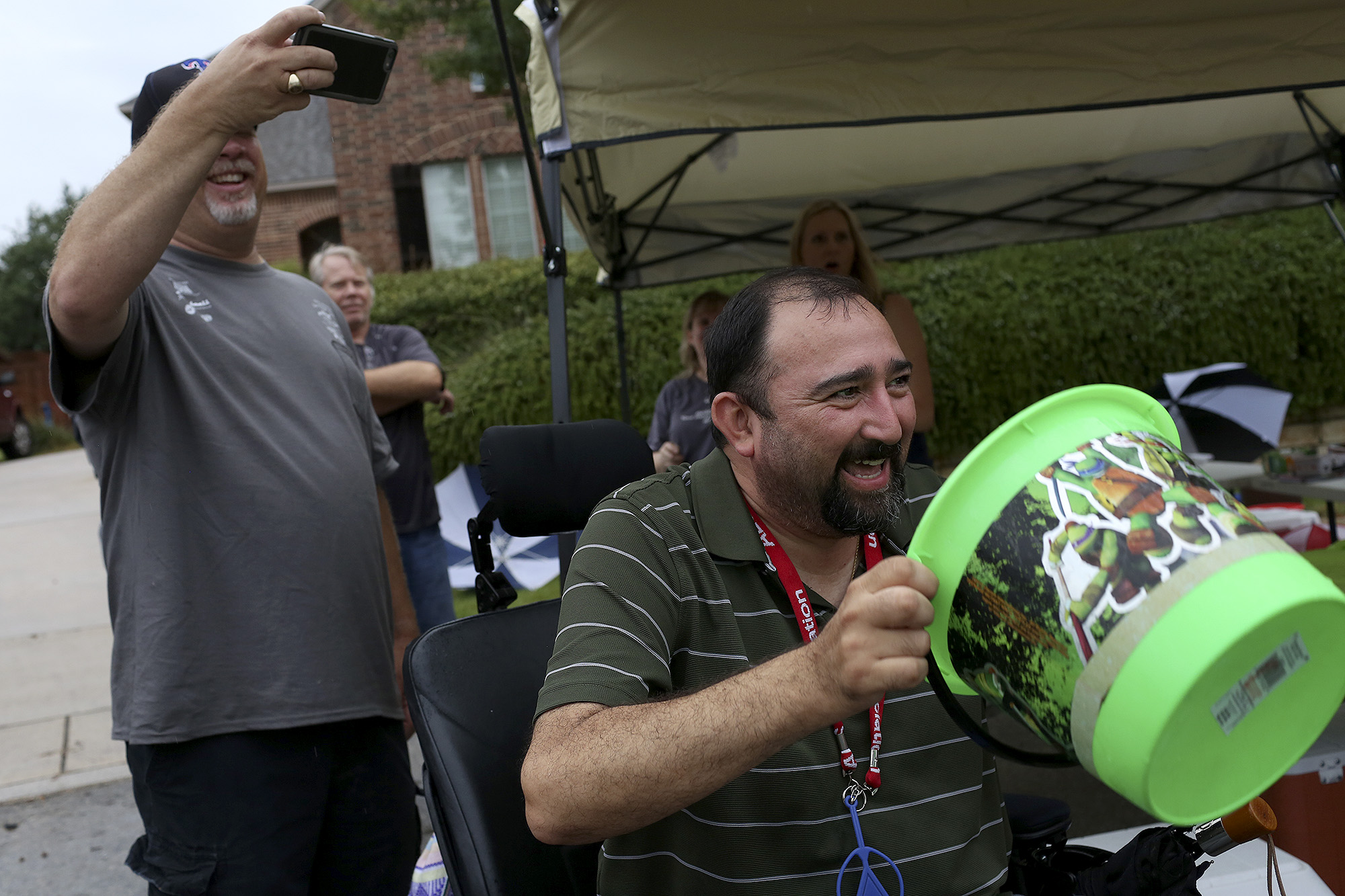 Community continues ice bucket challenge for beloved neighbor