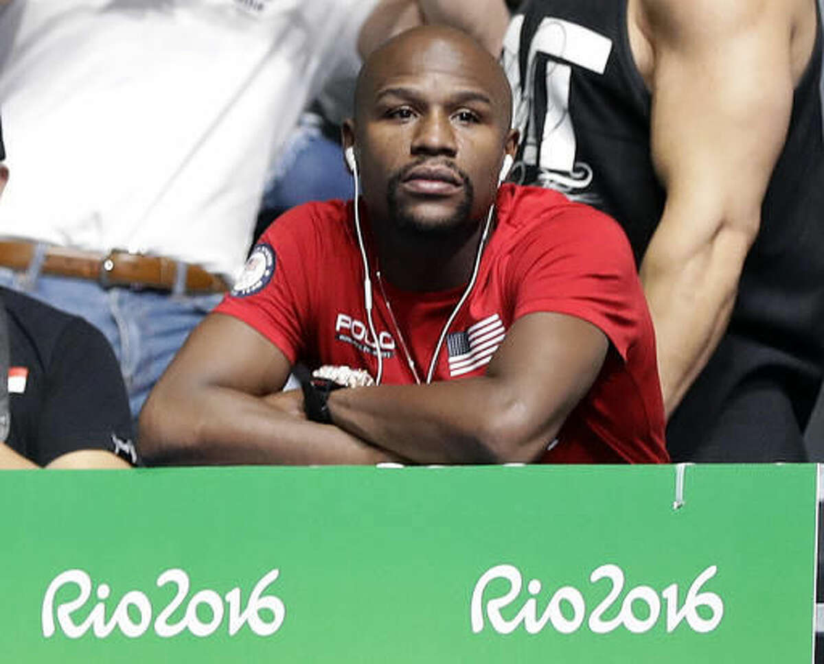 Floyd Mayweather checks on next generation of Olympic boxers