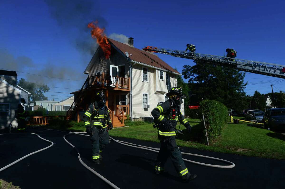 Firefighters battle East Norwalk house fire