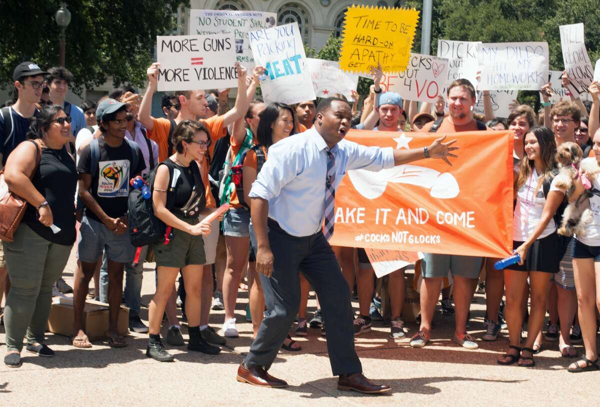 Photos: Students storm UT armed with colorful dildos and a powerful ...
