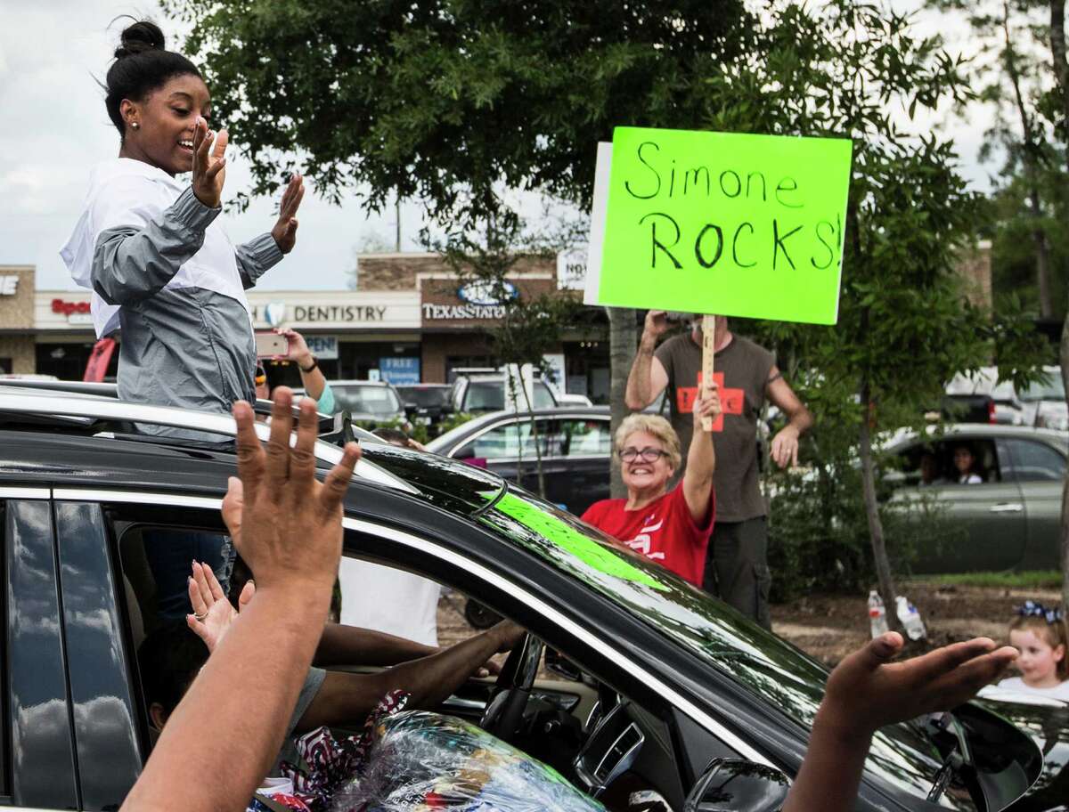 Biles completes record-breaking Olympic journey with return to Houston
