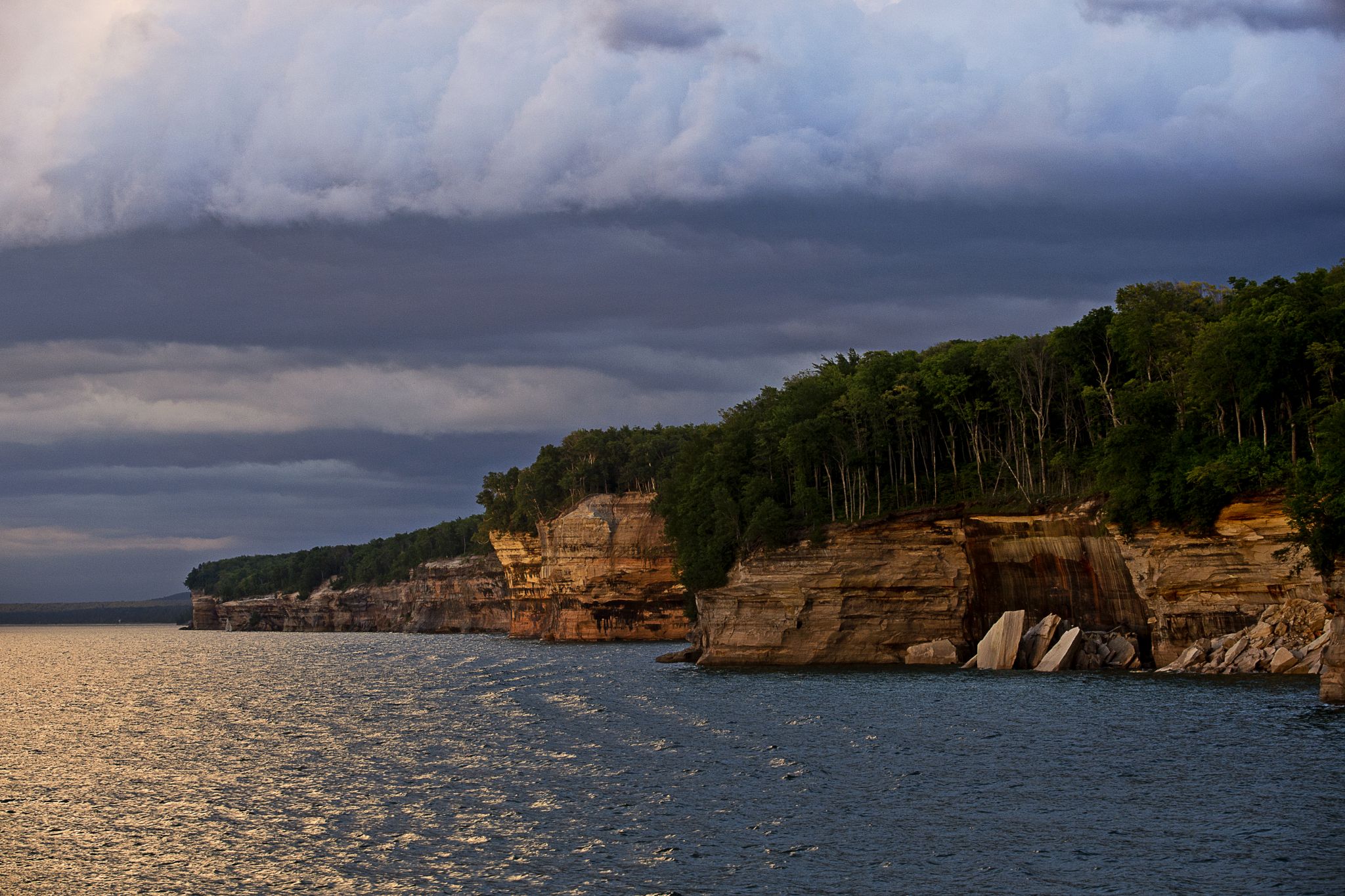 Part of Pictured Rocks cliff falls into Lake Superior