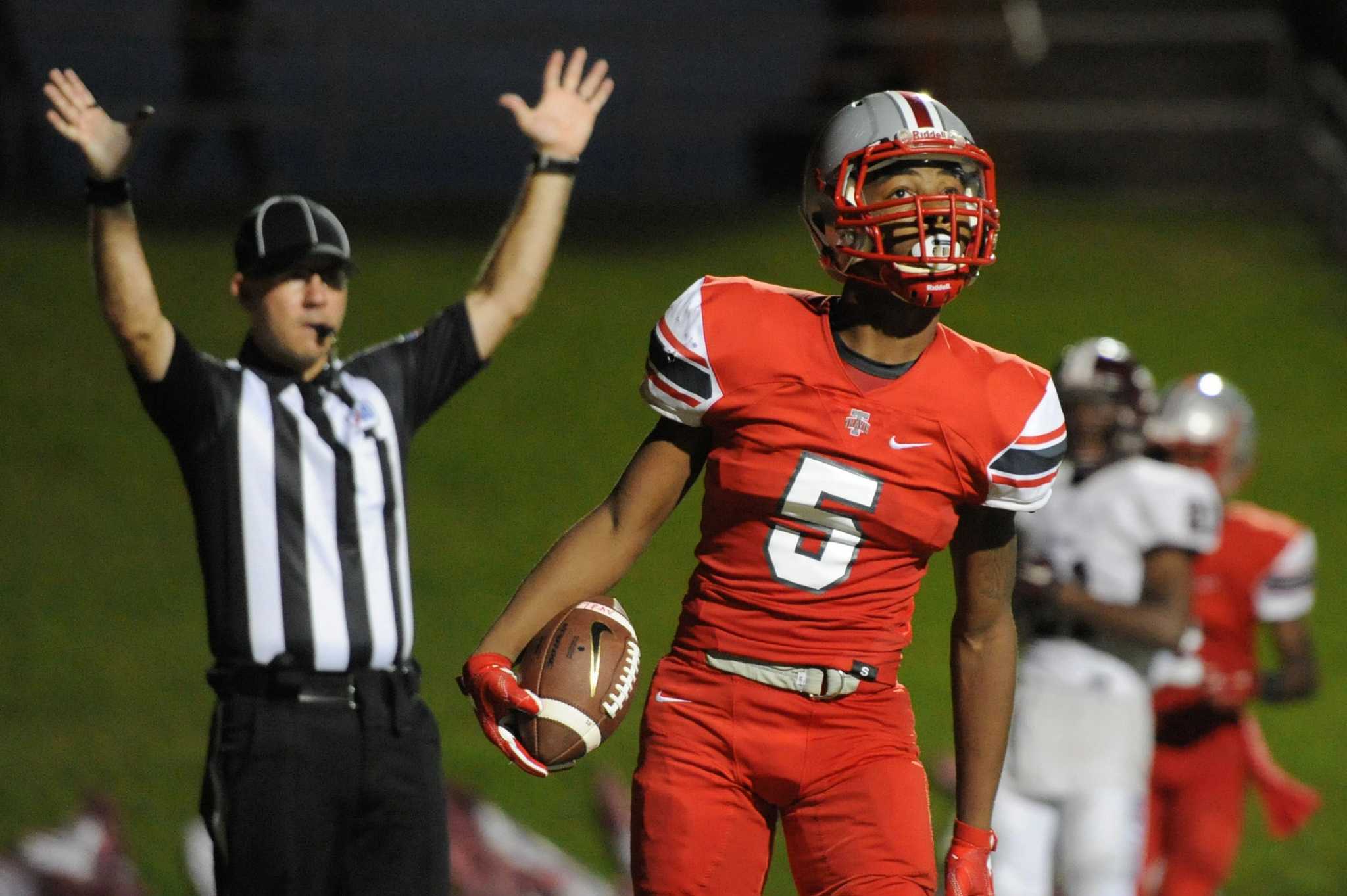 Superb second half propels Travis to victory against Heights