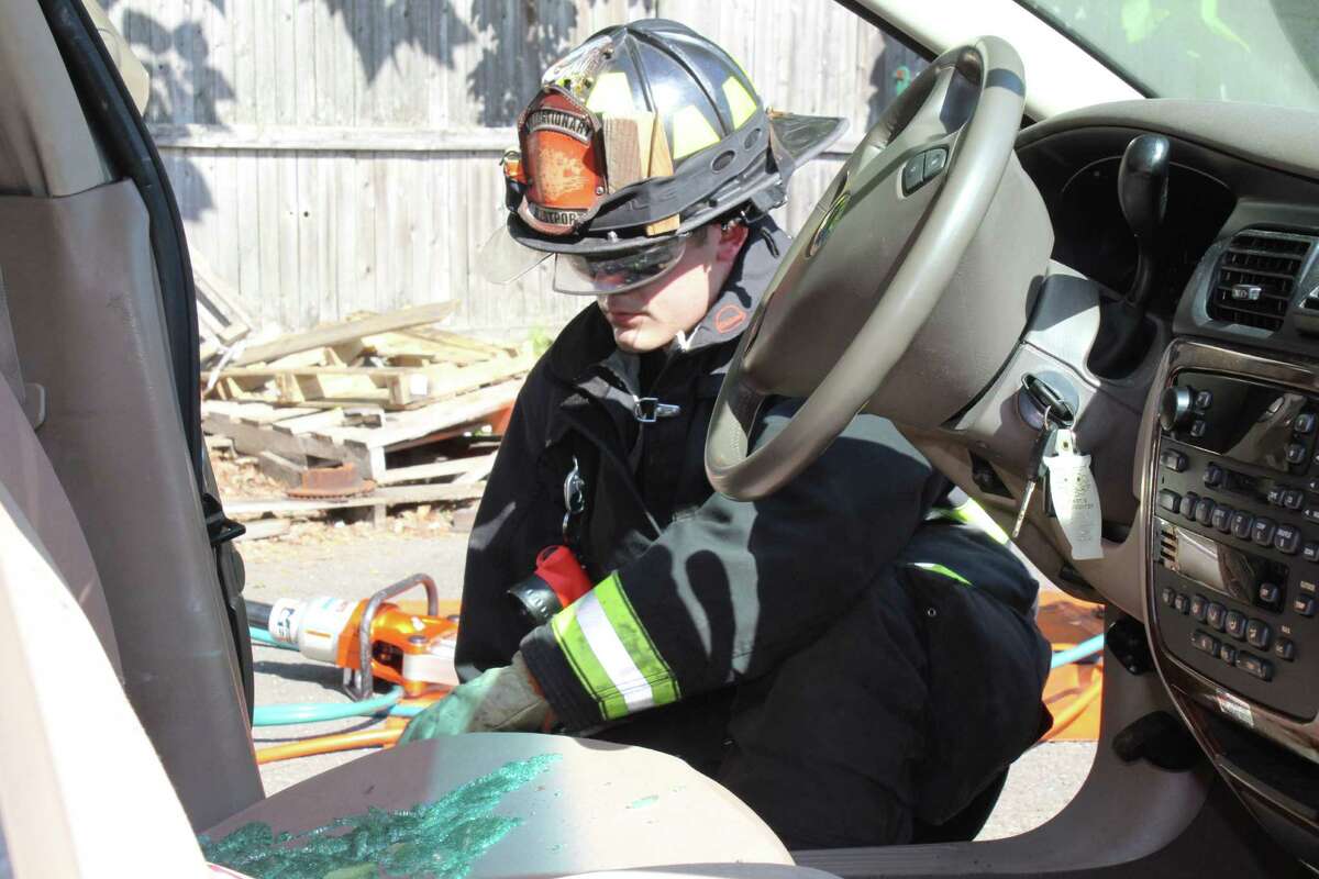 Firefighters practice car accident rescues
