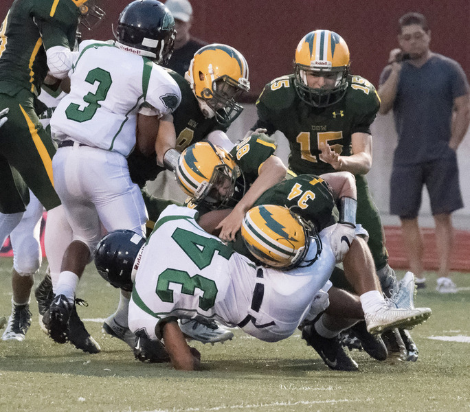 Unbeaten Dow football team shuts out Heritage, 35-0