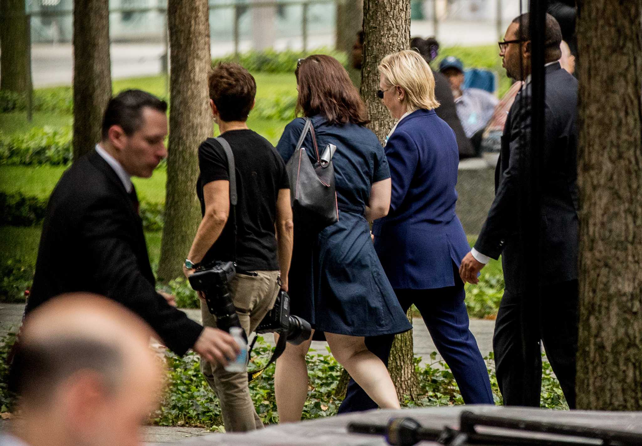 Video posted on Twitter shows Hillary Clinton held by staff, slumping ...