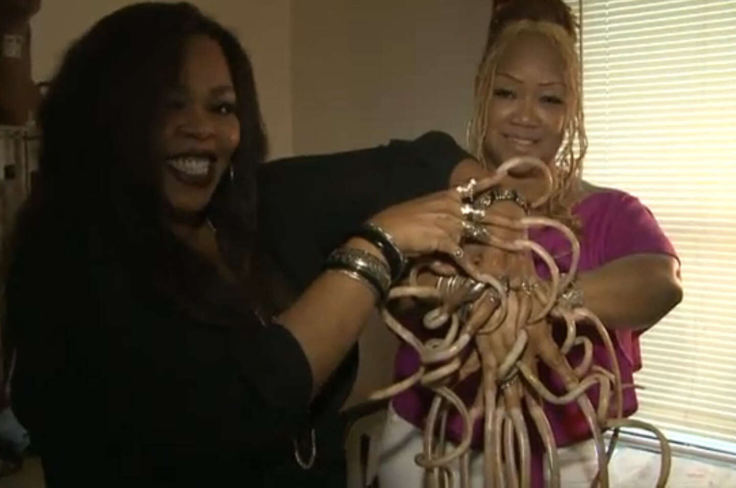 Houstonian grows fingernails to a remarkable 20 inches after 20 years