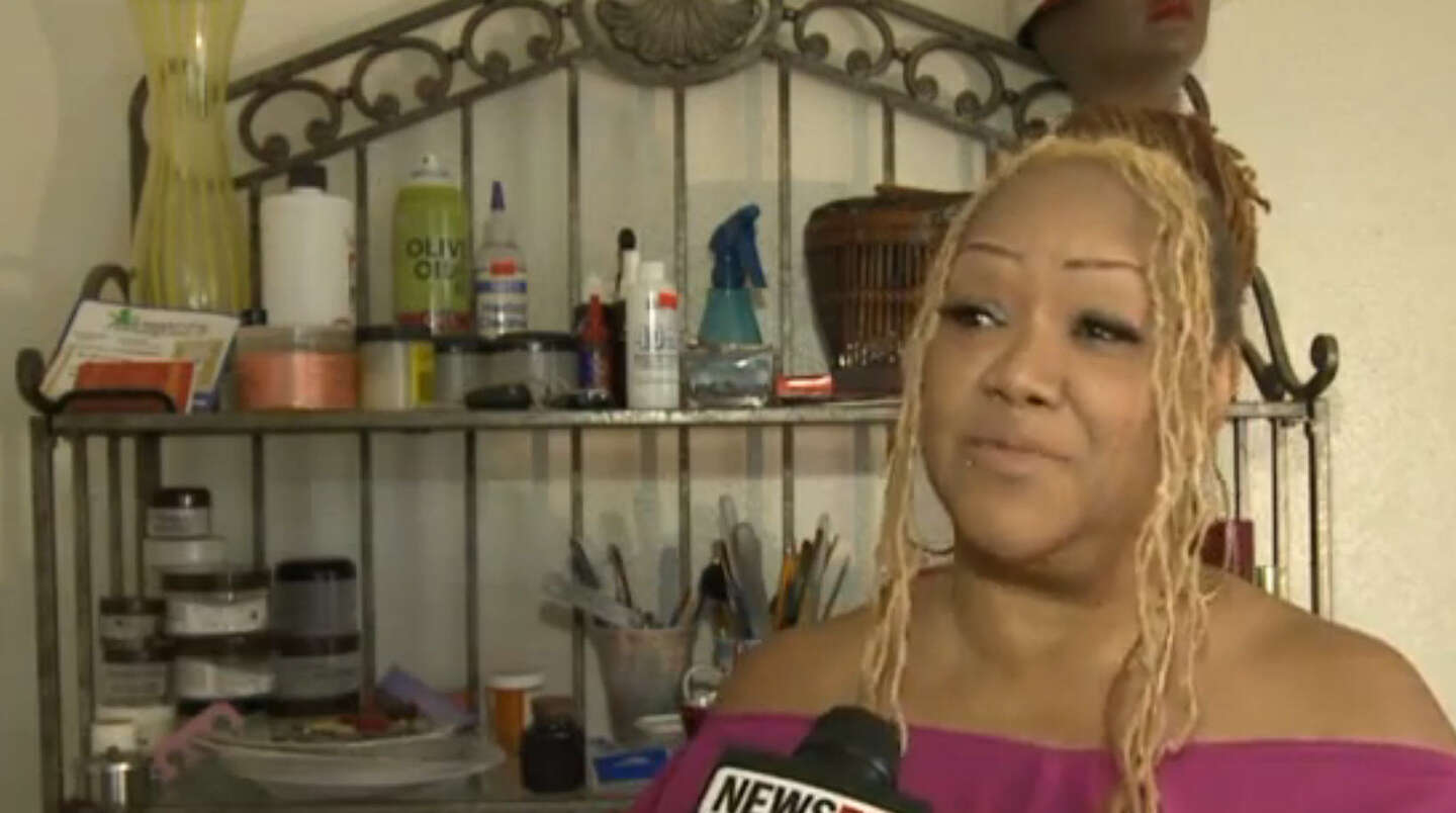 Houstonian grows fingernails to a remarkable 20 inches after 20 years