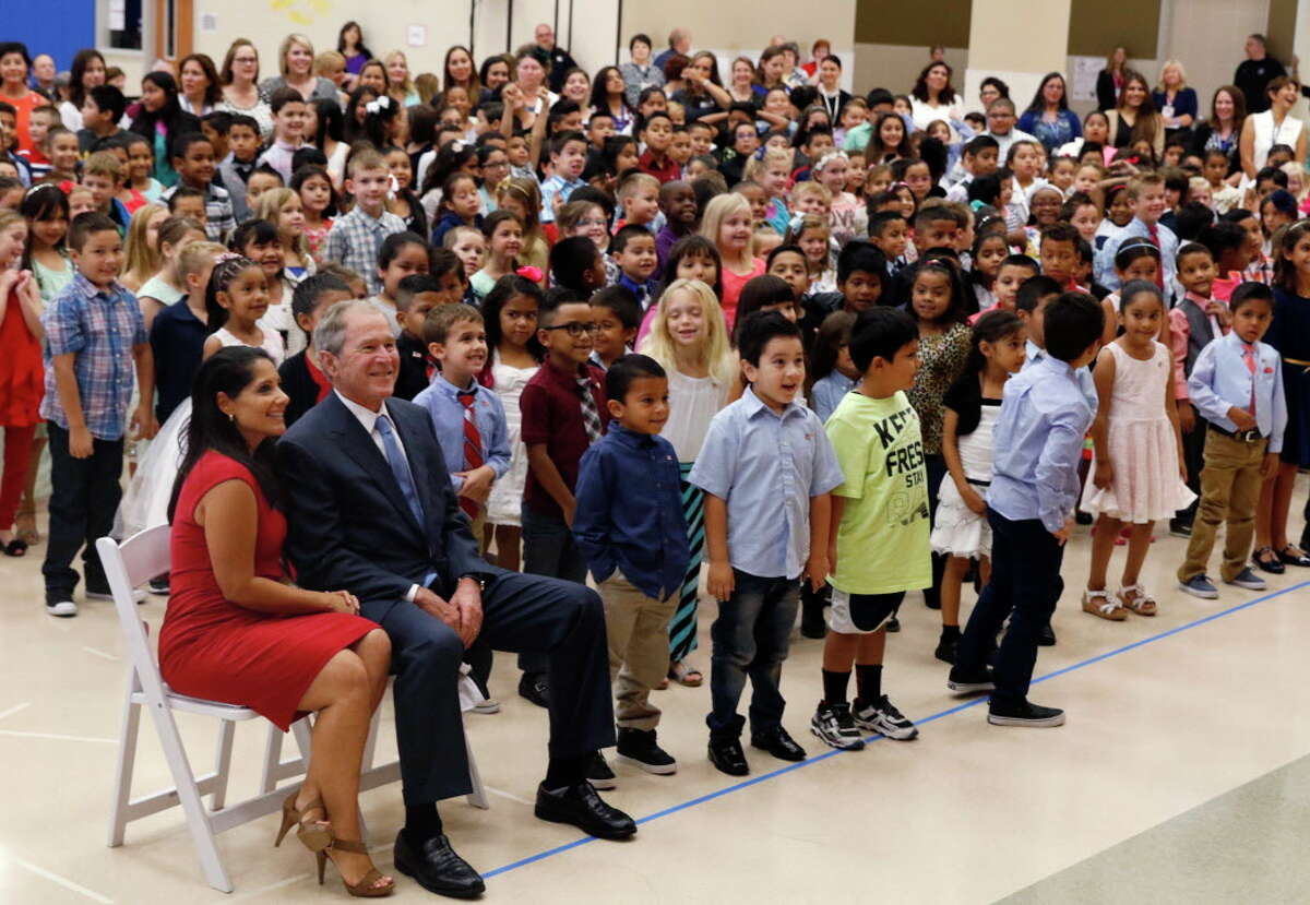 Former President George W. Bush visits the new elementary named after ...
