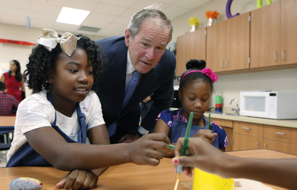 Former President George W. Bush visits the new elementary named after ...
