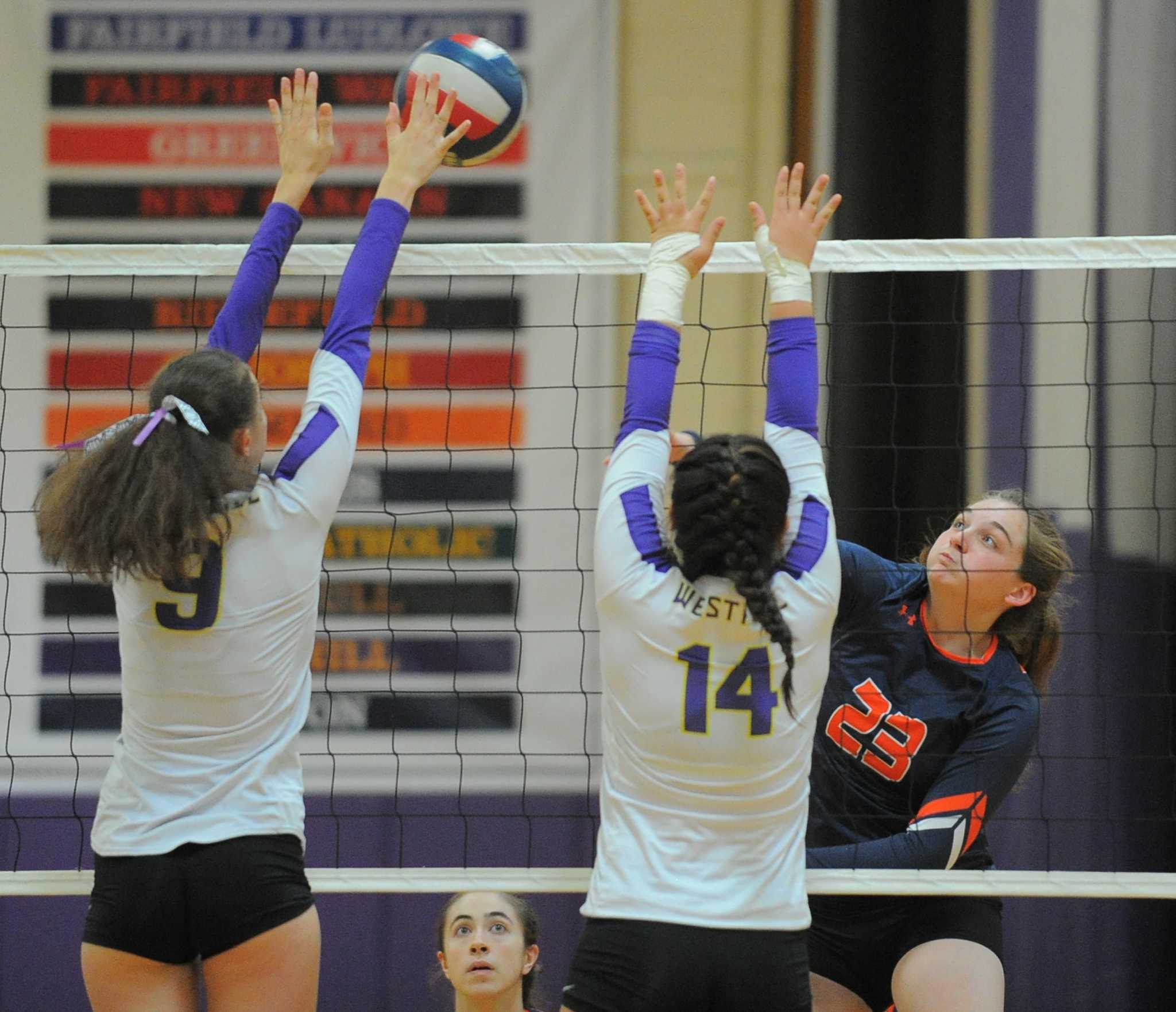Danbury volleyball holds off Westhill in 4 games