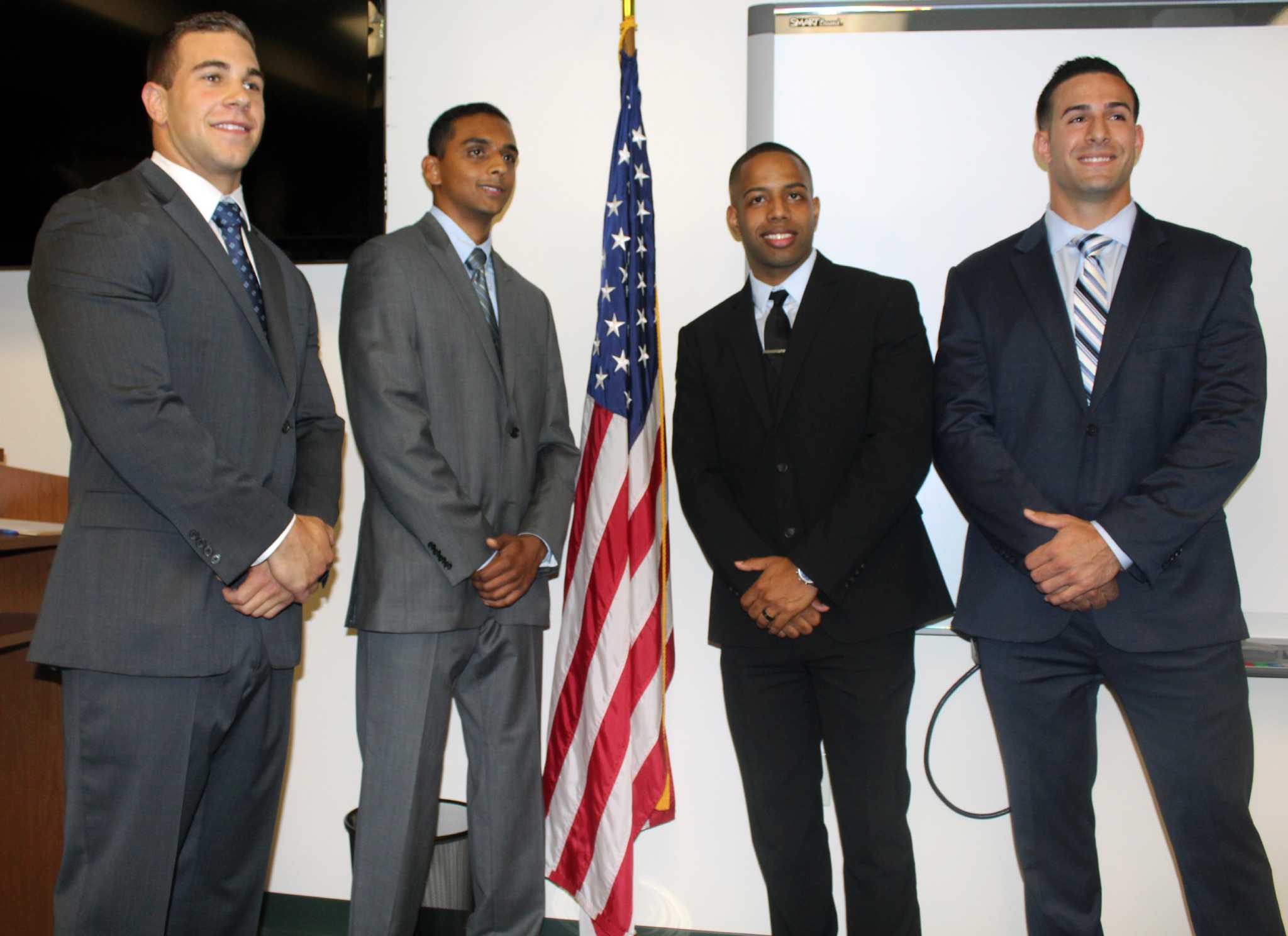 Darien police swear in 4 officers