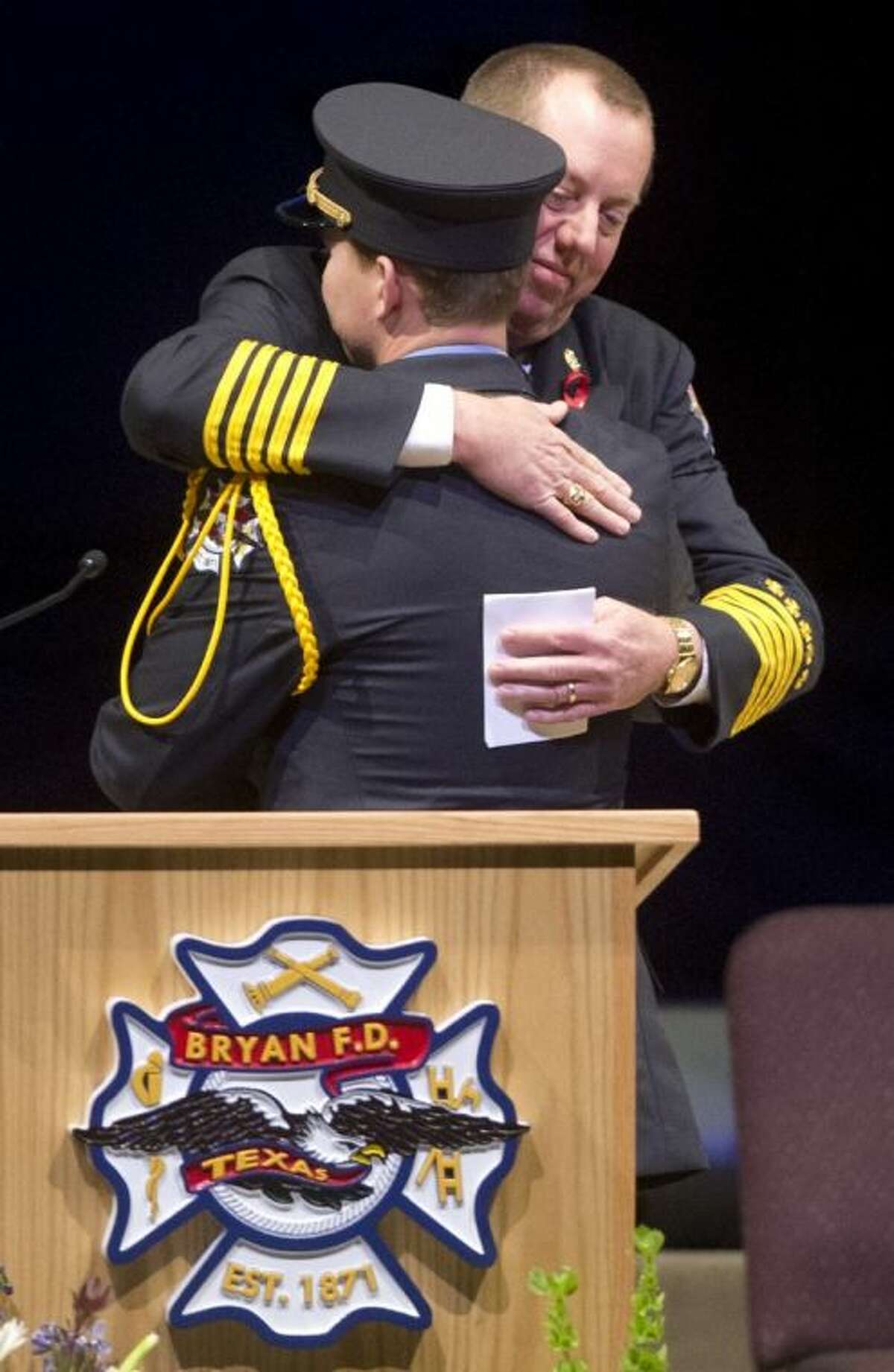 Mourners remember 2 Bryan firefighters who died in blaze