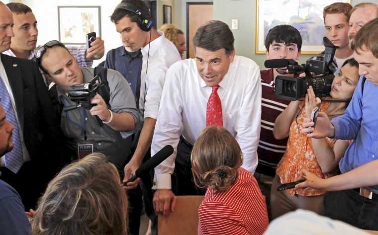 Perry exudes confidence, swagger on campaign trail