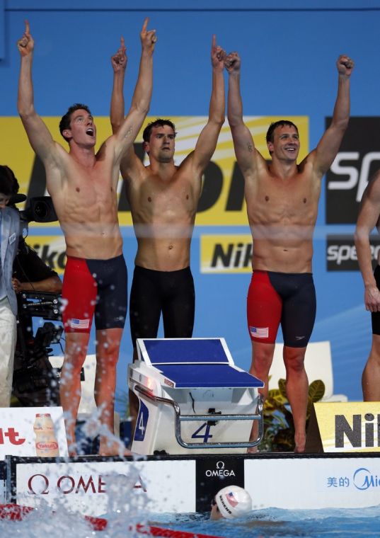 Lochte claims 2 golds on epic night of swimming