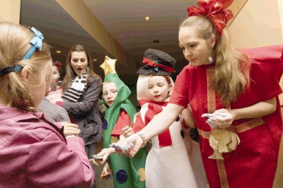 Foster children and their parents enjoy holiday Christmas parties