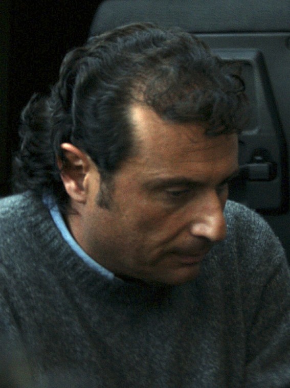 Coast Guard to Italian captain: Go back aboard!