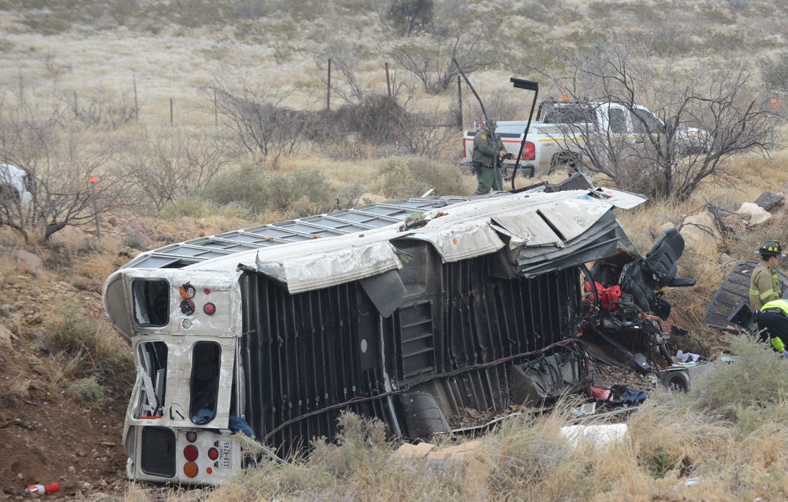 Agency: Damaged guardrail caused Texas prison bus wreck