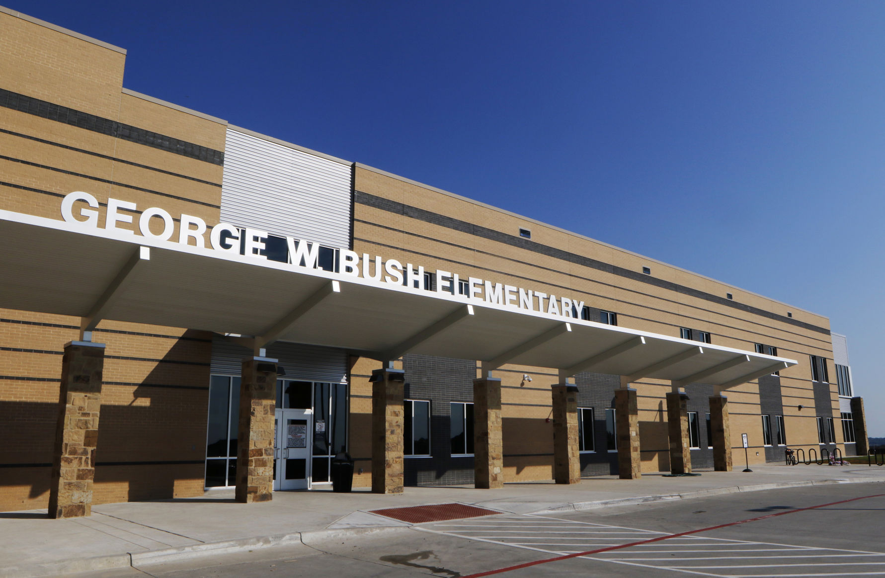 George W. Bush helps dedicate 1st Texas school named for him