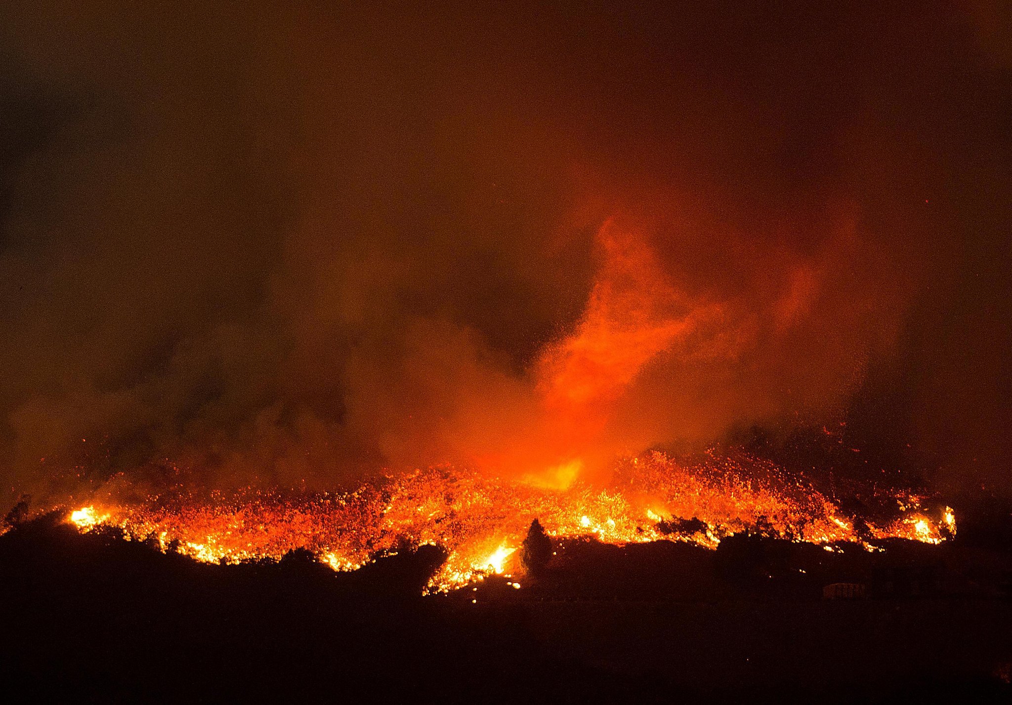 Loma Fire containment grows to 34 percent, but burn zone spreads