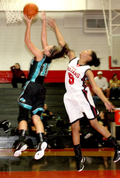 GIRLS BASKETBALL: Lady Trojans at doorstep to really rare playoff berth