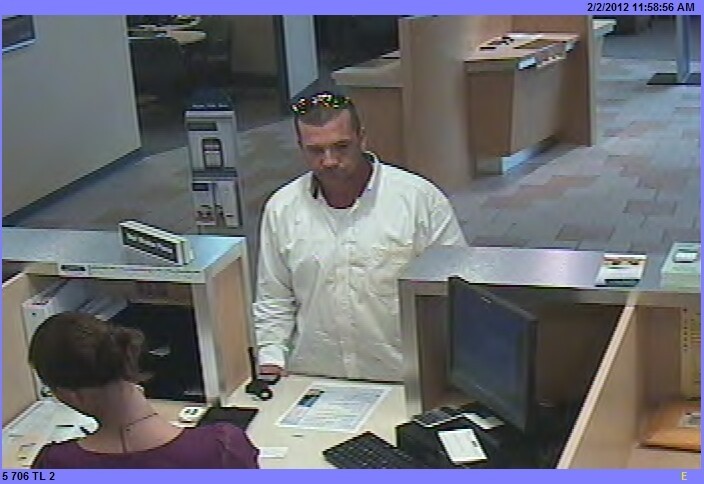 ‘Tall, dark, handsome bandit’ identified, charged: FBI needs help to ...