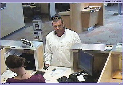 "Tall, Dark and Handsome Bandit" bank robber identified by FBI