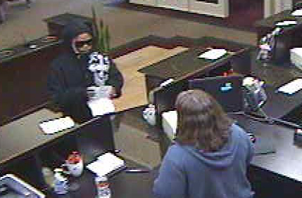 Law enforcement responds to bank robbery on College Park Drive