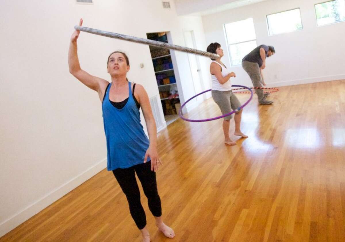 Area woman provides a fun workout with hooping