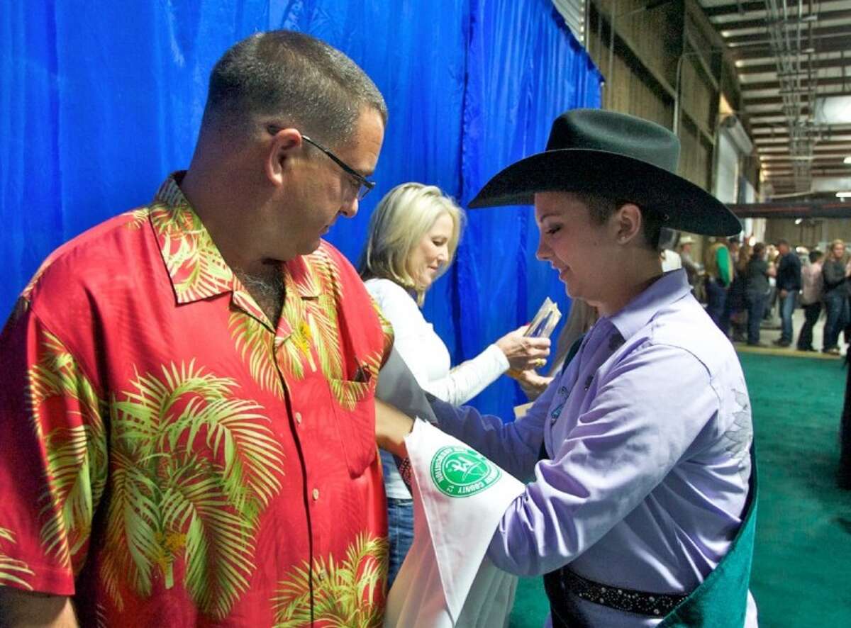 Steer sold for record $65K at fair auction