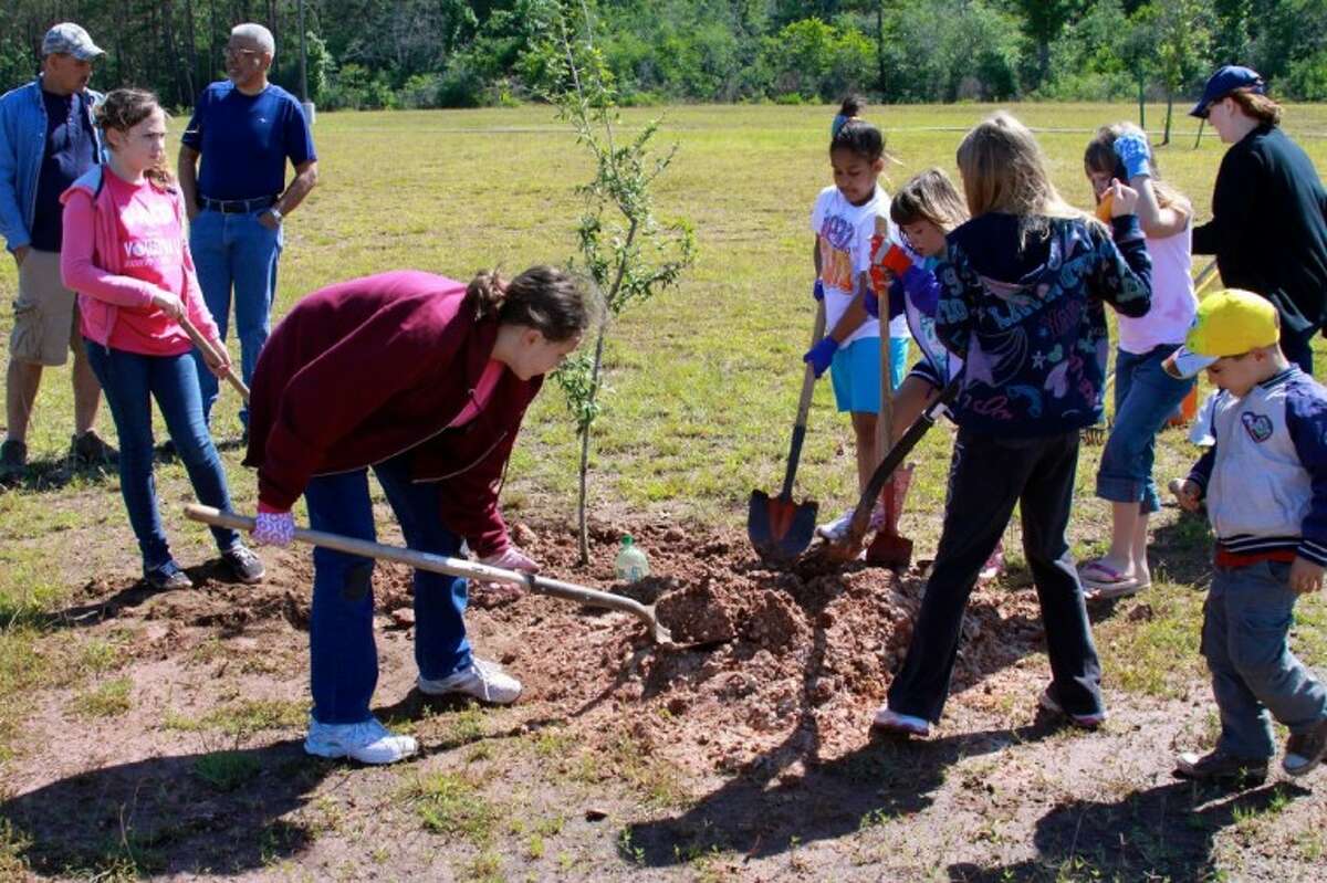 Girl Scouts lend a hand to mother nature at Earth Day Celebration