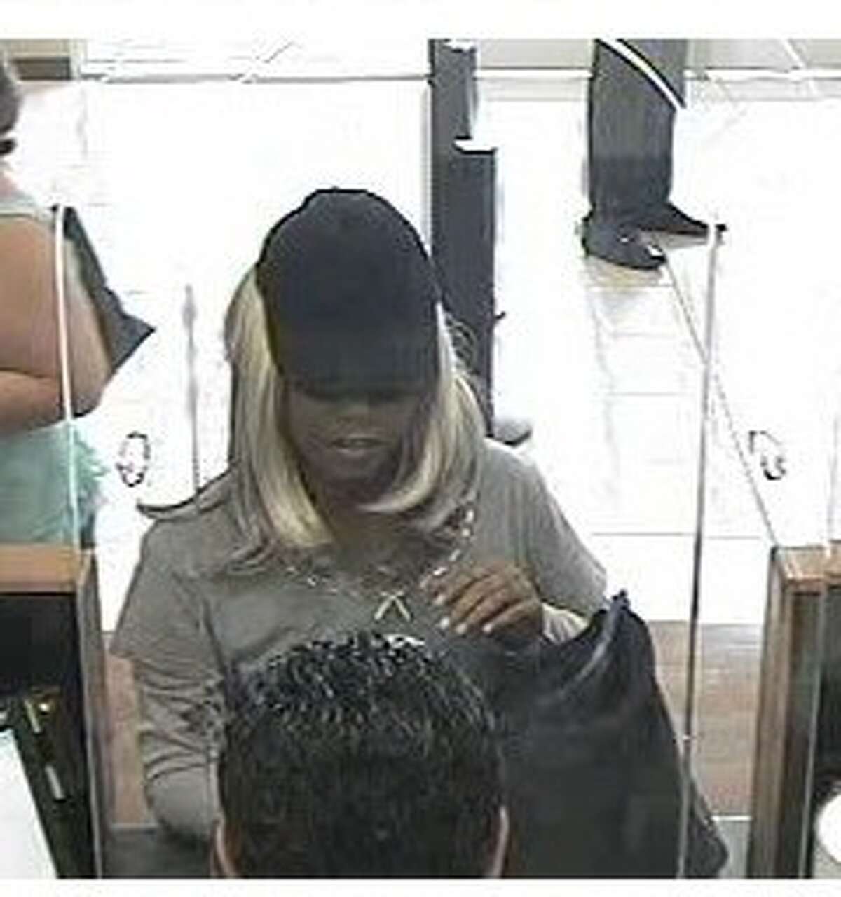 FBI seeks cross-dressing bank robber who struck Memorial-area Chase branch