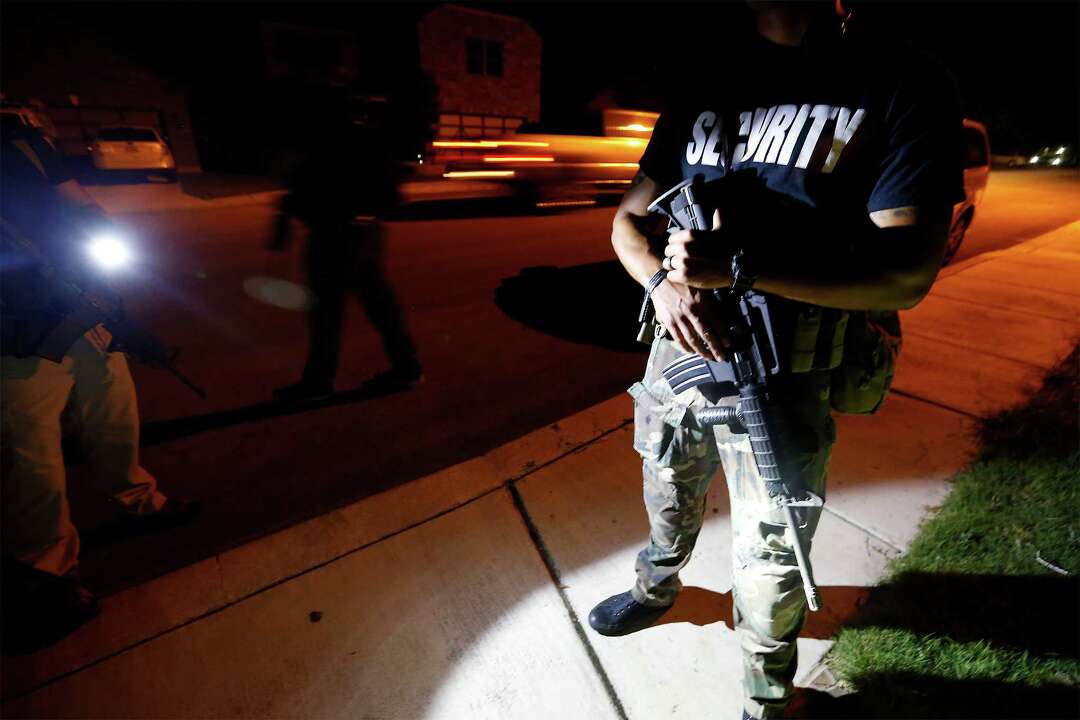 Meet the armed patrol members who carry assault rifles around their ...