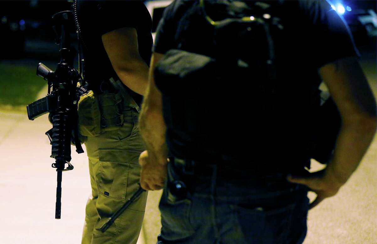 Meet the armed patrol members who carry assault rifles around their ...