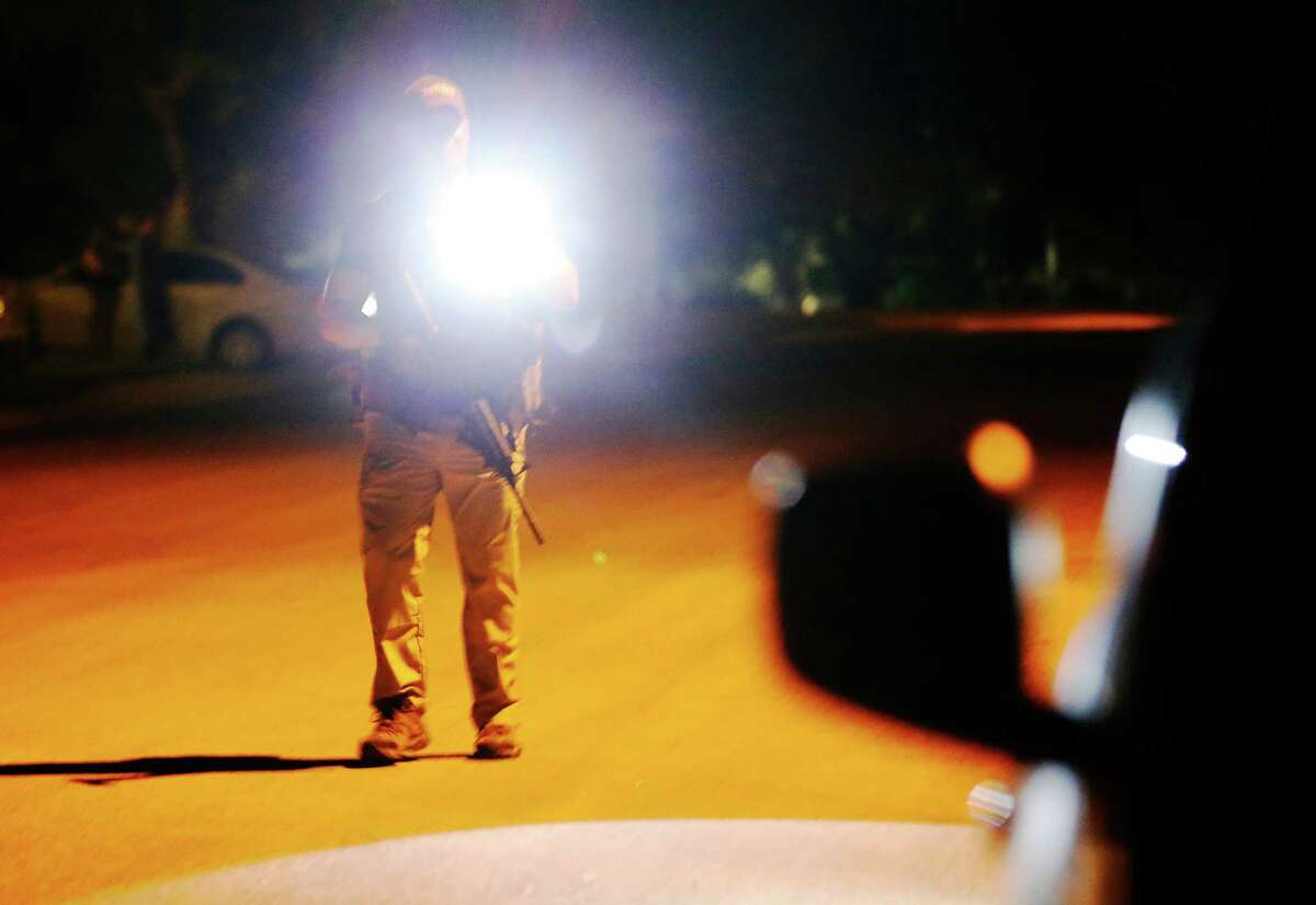 Meet the armed patrol members who carry assault rifles around their ...