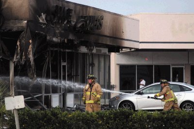 Two injured at dry cleaners fire