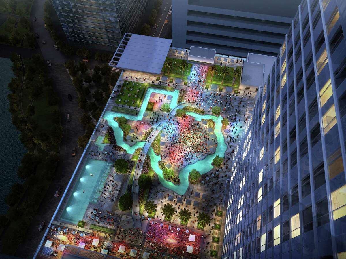 Photo: New Texas-shaped pool at Marriott Marquis is lit up at night for ...