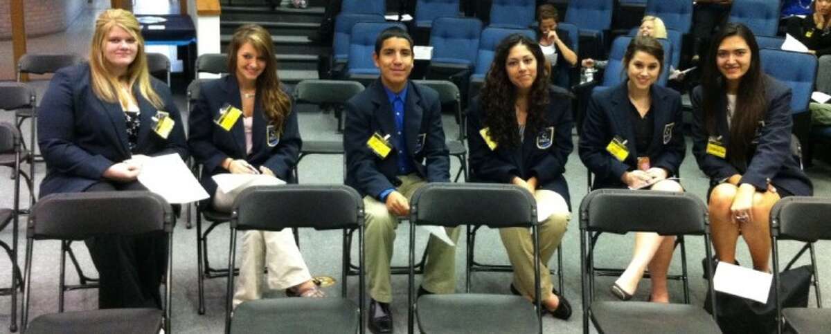 Magnolia High DECA students fare well in mock competition